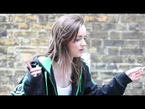 Geordie Smoking Model Alice blowing smoke rings during fag break from photo shoot