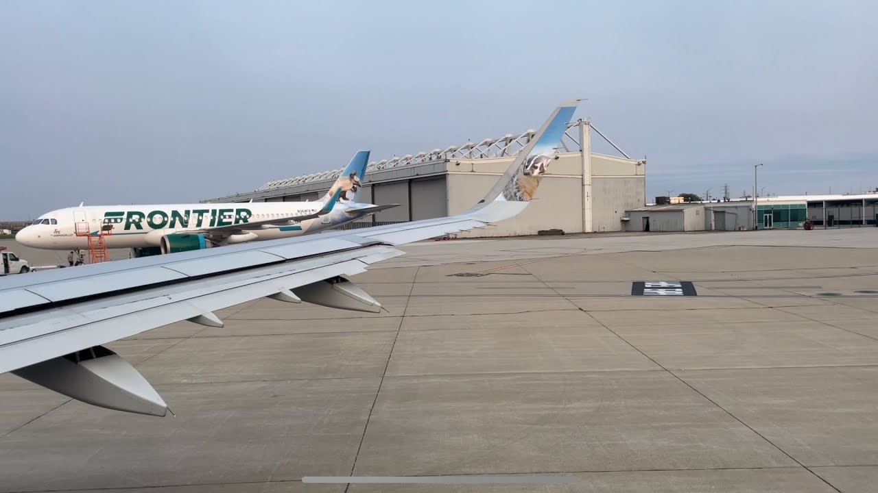 Frontier Airlines A321 boarding, pushback, and sunset departure from ...