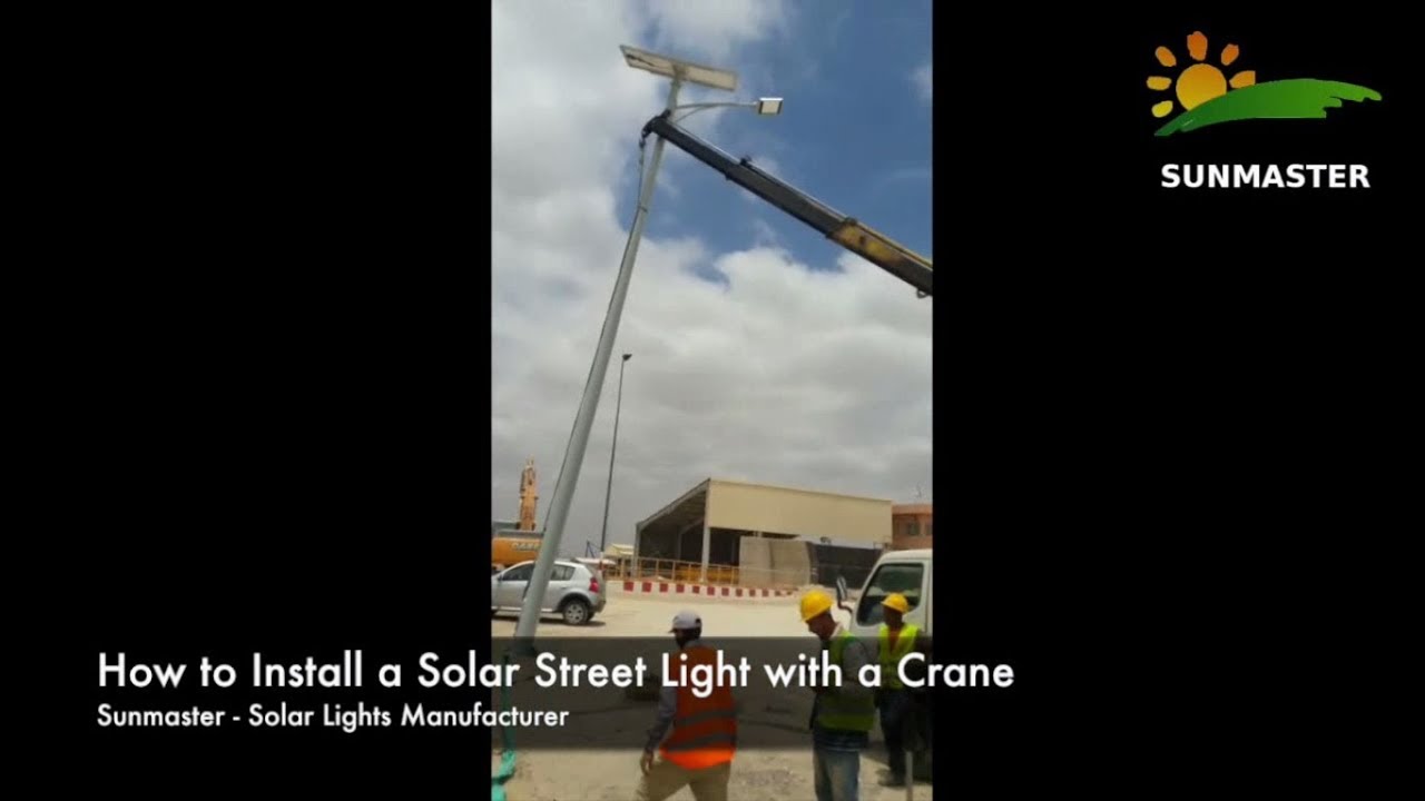 How to Install a Solar Street Light with a Crane - Sunmaster - YouTube