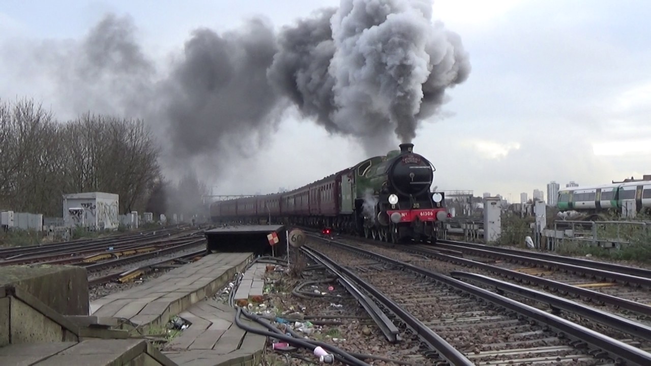 LNER Thompson Class B1 61306 and 47580 passing Clapham Junction - YouTube