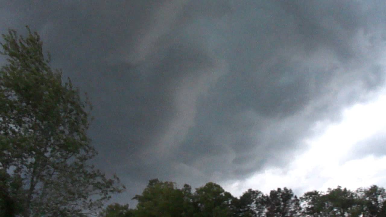 Storms associated with a cold front roll in over home - YouTube