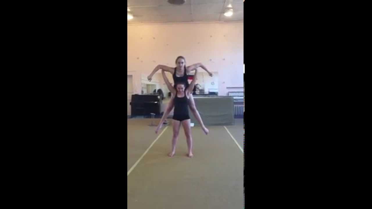 Small girl overhead lifts a big girl - YouTube