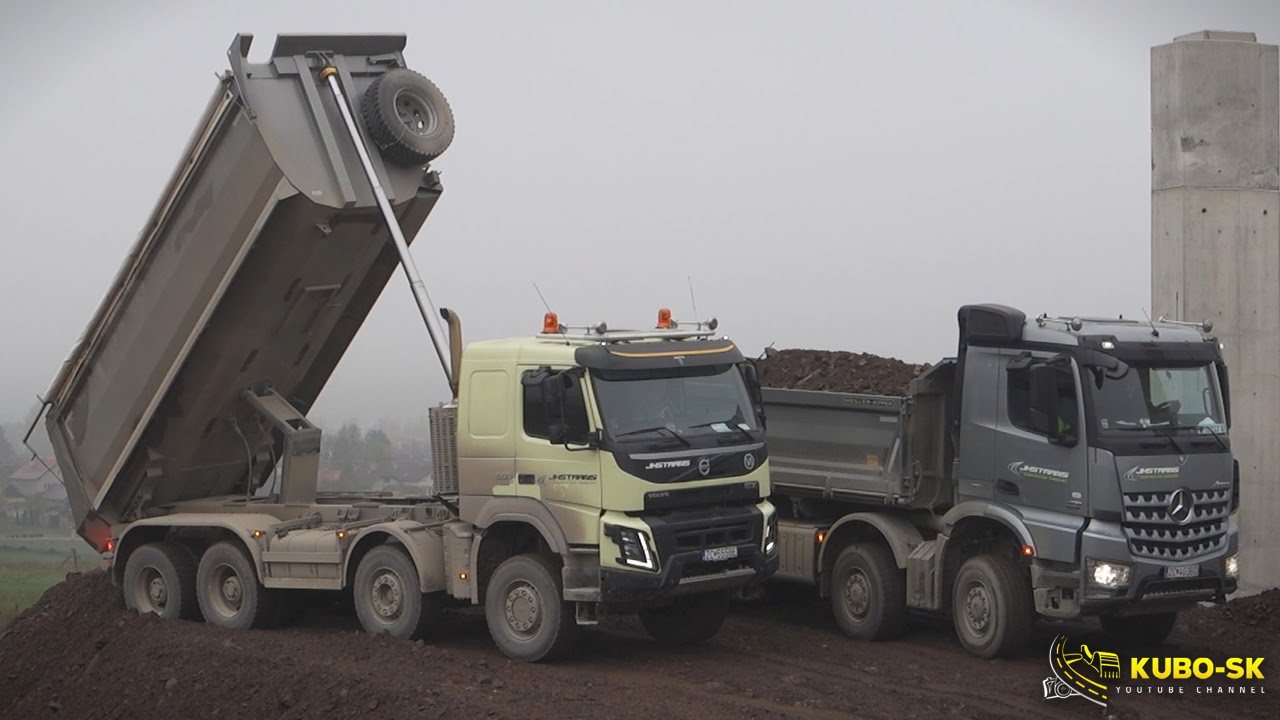 Volvo FMX and Mercedes Arocs tipper trucks - unload quarry stone - YouTube