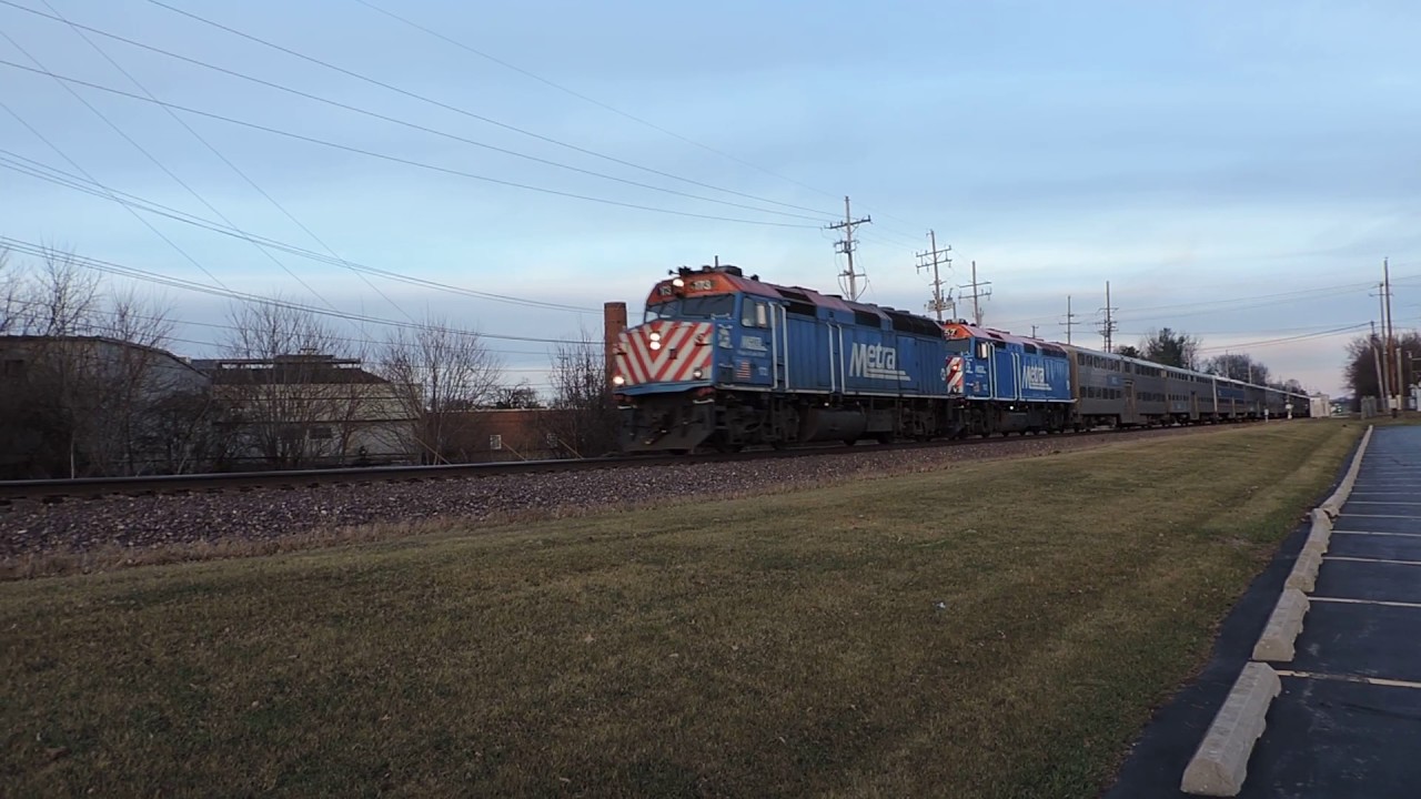 Metra outbound in Geneva with 2 engines a ONP car and a ex CNW pullman ...