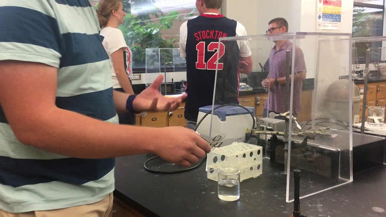 Heating test tube with Bunsen burner - YouTube