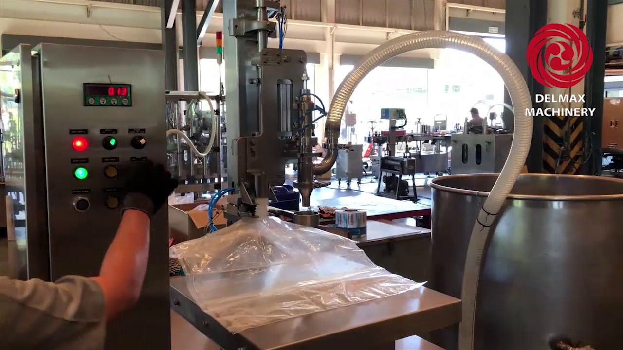 เครื่องบรรจุ - ปิดฝากด น้ำมันพืชลงถุง (Bax in Box) - YouTube