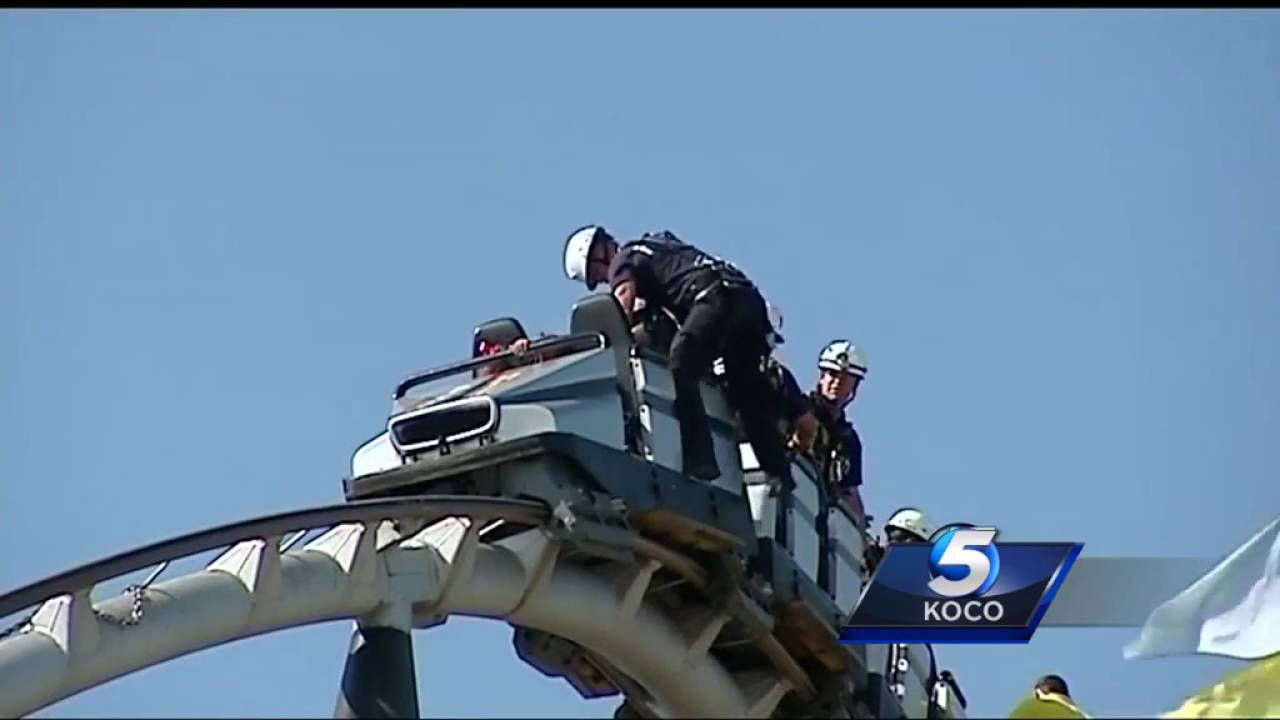 Eight people removed from stuck Silver Bullet roller coaster - YouTube
