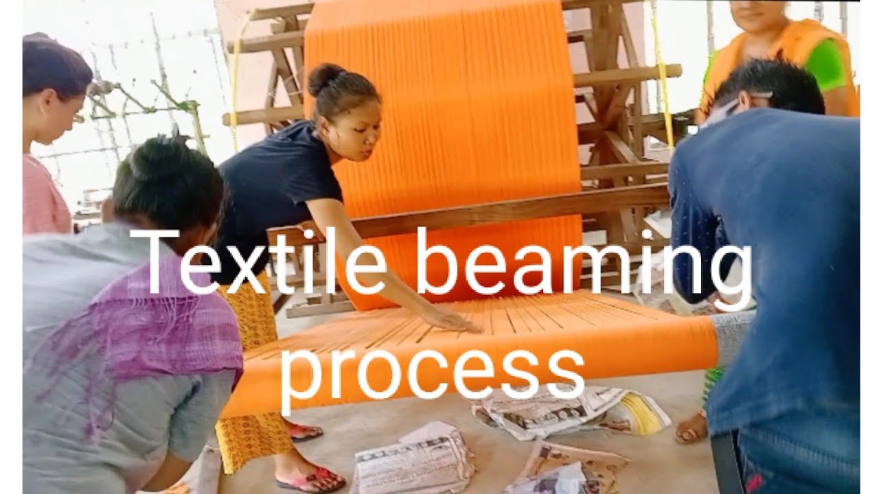 Textile beaming process - YouTube