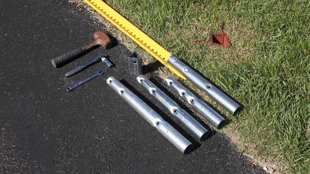 Installing U-channel adapter into V-Loc Breakaway Post Anchor - YouTube