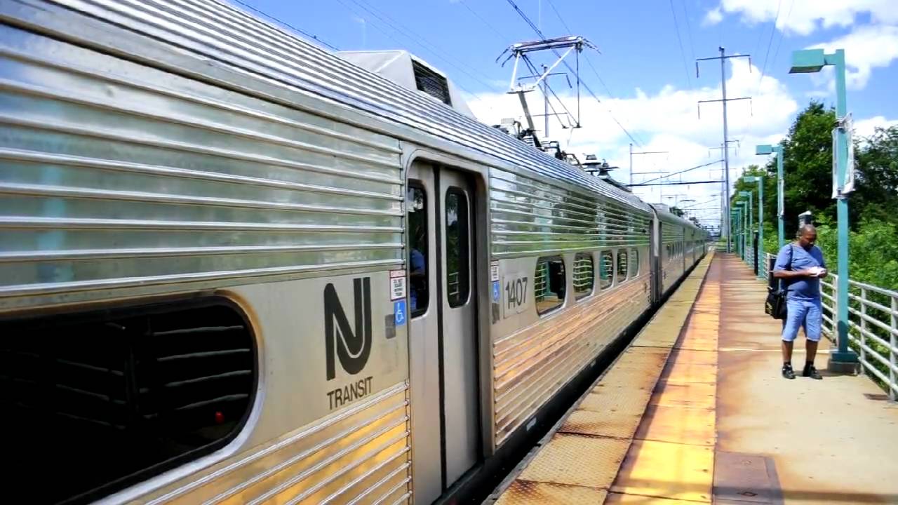 NJT General Electric Arrow III #1407 on NEC Train 3852 New York bound departing Elizabeth - YouTube