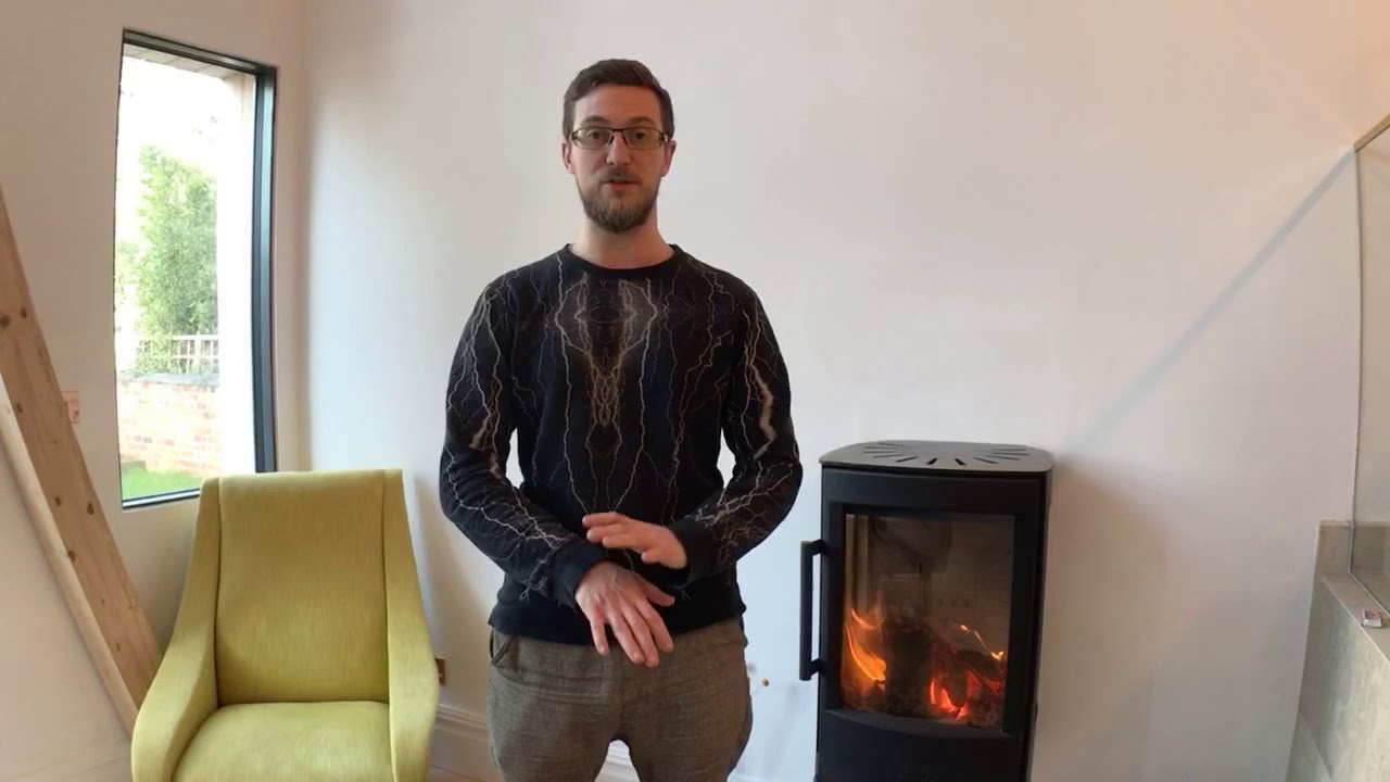 Reducing drafts and heat loss with a direct air feed wood stove at the ...