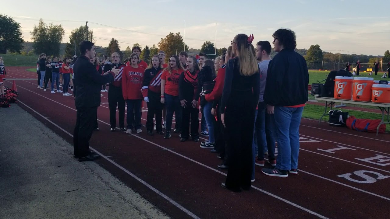 Lakeview Sailors Chamber Singers perform the National Anthem to open ...