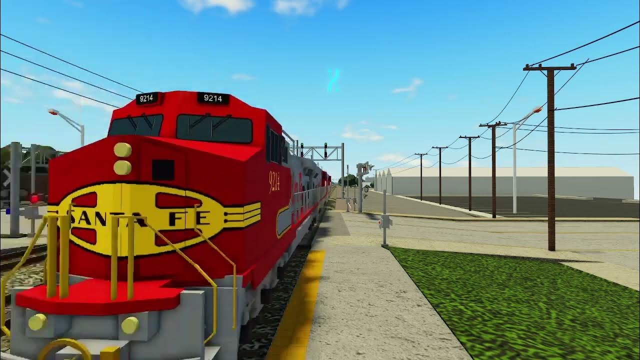 (Old Clip) BNSF 9059 leads a piggyback - YouTube