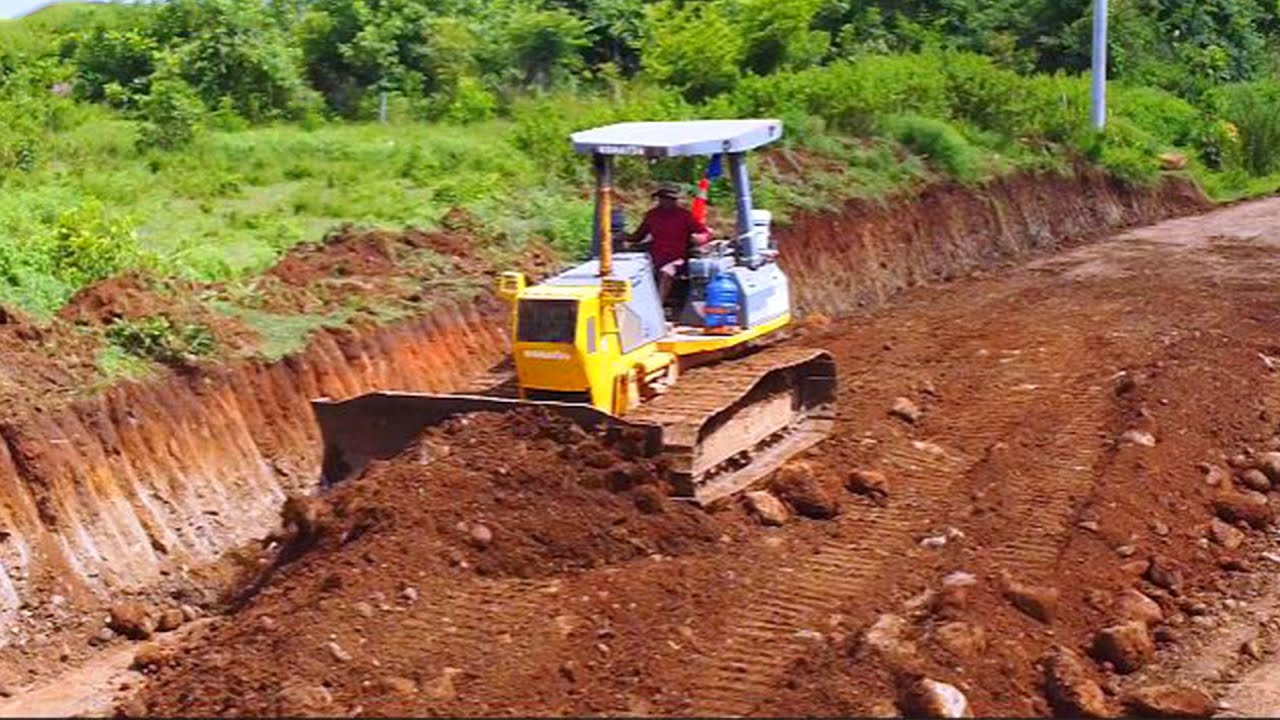 Pushing Action!! Clearing and pushing rocks requires a lot of force ...