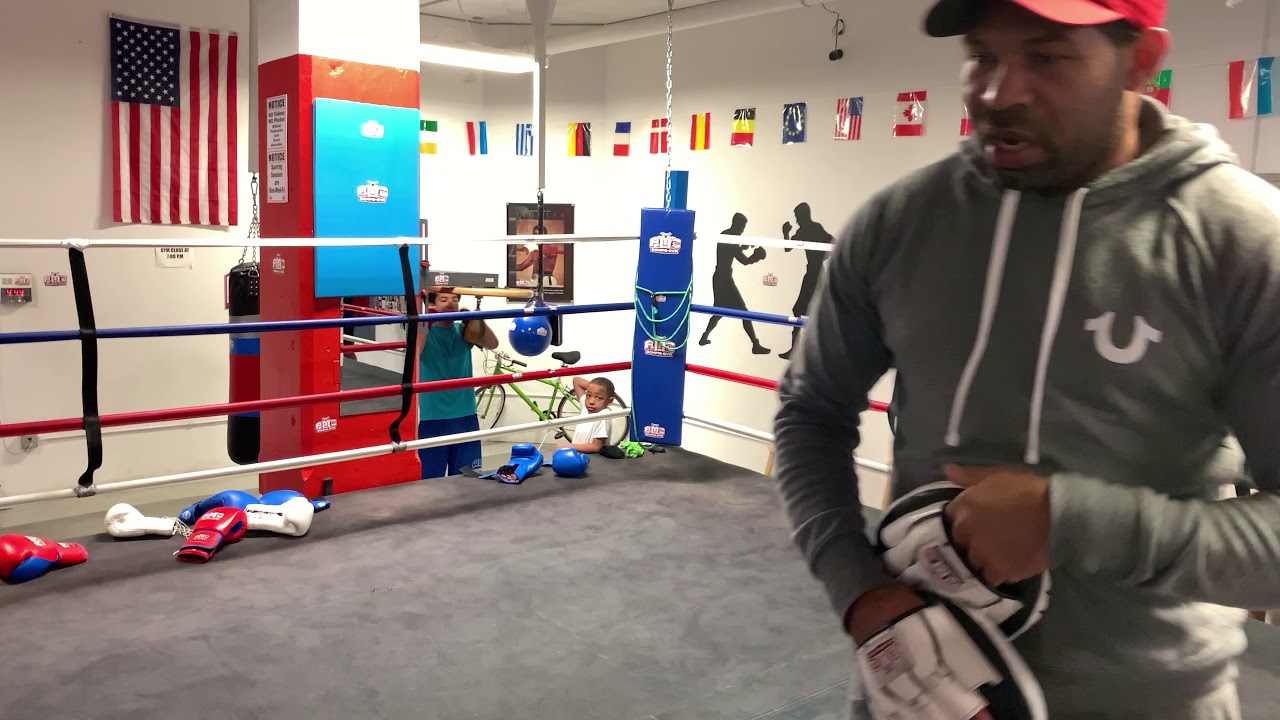 Coach Mercedes training boxers at AMC Boxing Gym - YouTube