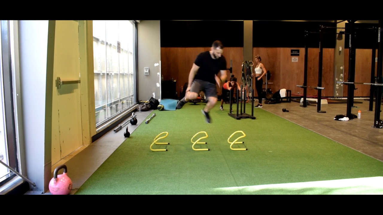 Exercise Library - SAQ - Lateral single hurdle hop continuous - YouTube