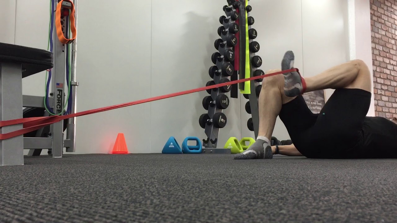 Lying resistance band hip flexion - YouTube