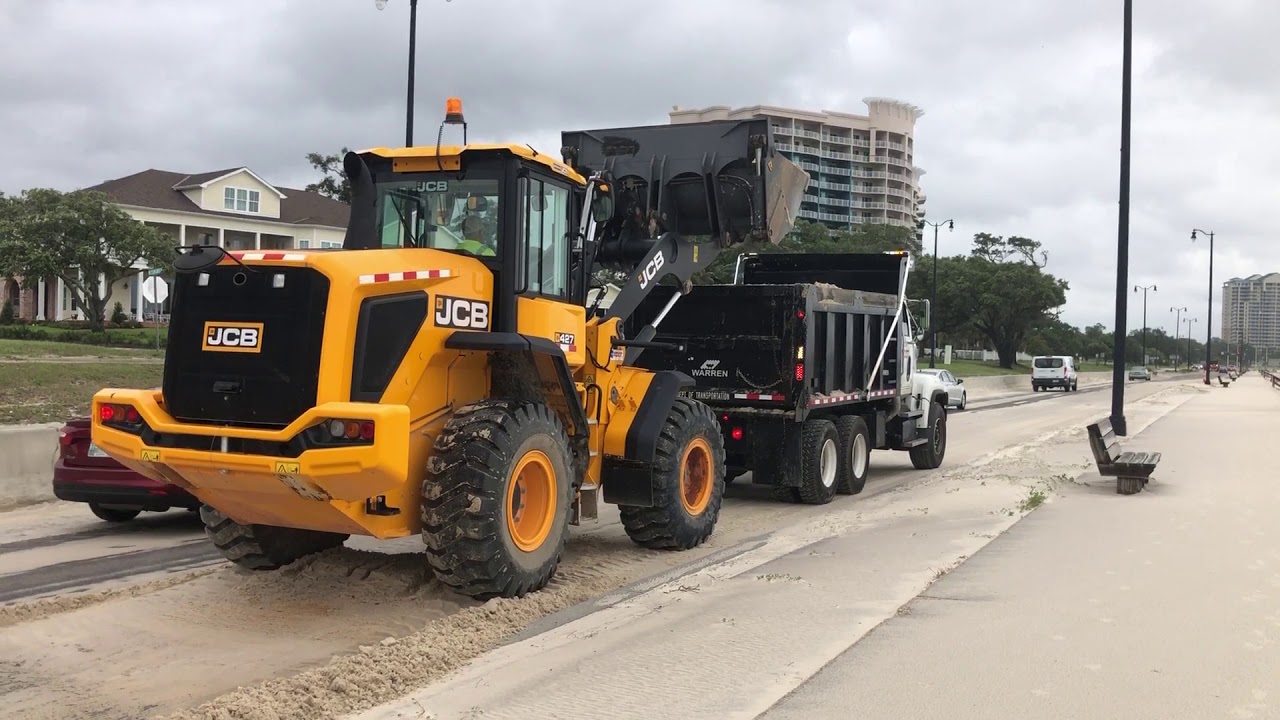 MDOT crews clear sand and debris along U.S. Highway 90 in Harrison ...