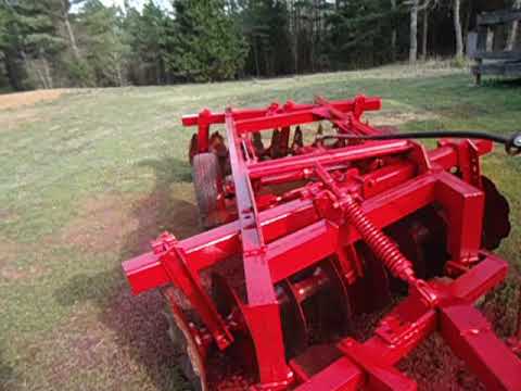 Bush Hog 145 offset disc cleaned and painted - YouTube