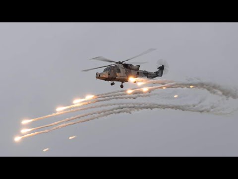 Wildcat helicopter carrying out missile lock avoidance using chaff and ...