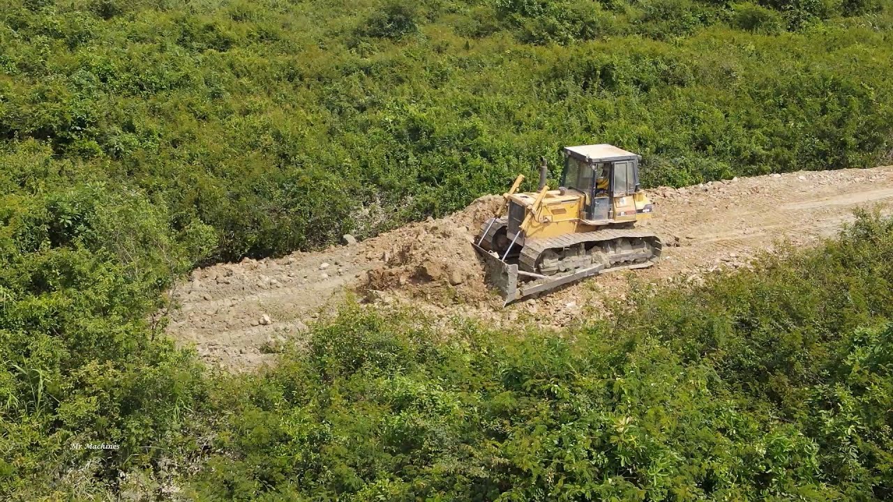 Strong Operator Skills Dozer Pushing Dirt at New Beautiful Road ...