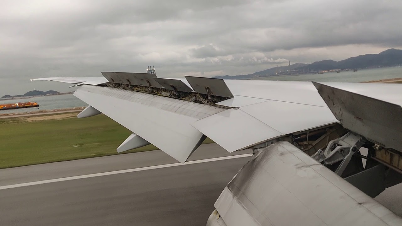LX138 | B77W | Landing at HKG - YouTube