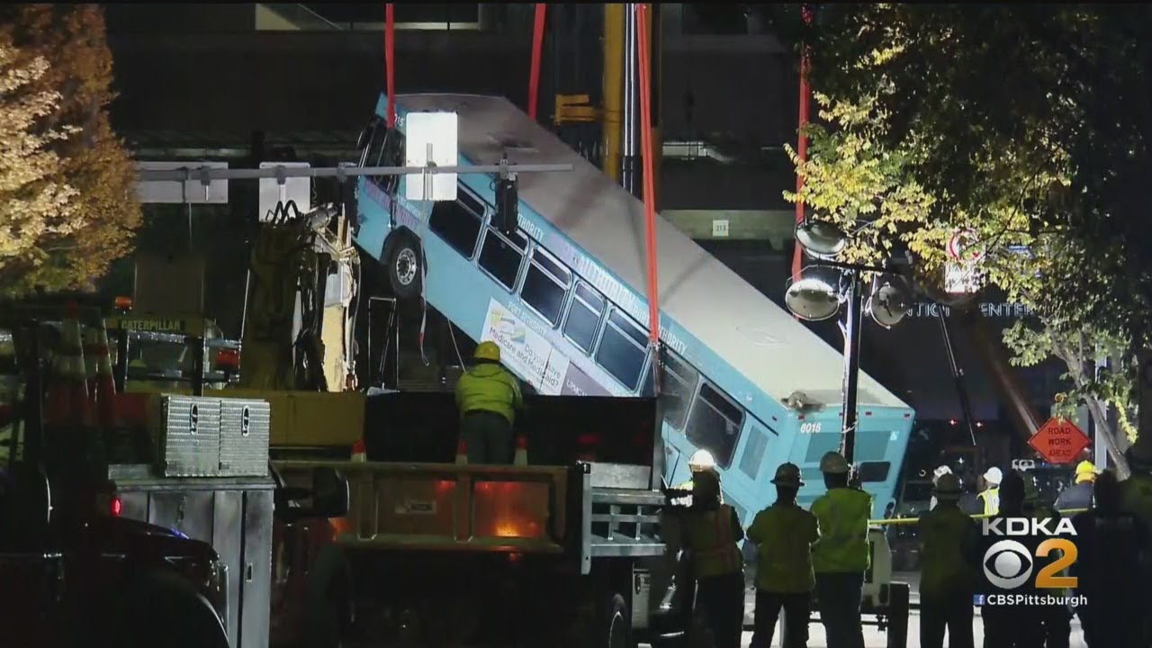 City Officials Assess Damage Following Bus Being Removed From Sinkhole ...