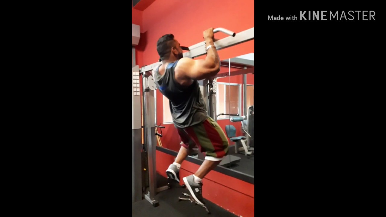Sukha Bouncer doing pull ups in the gym. - YouTube