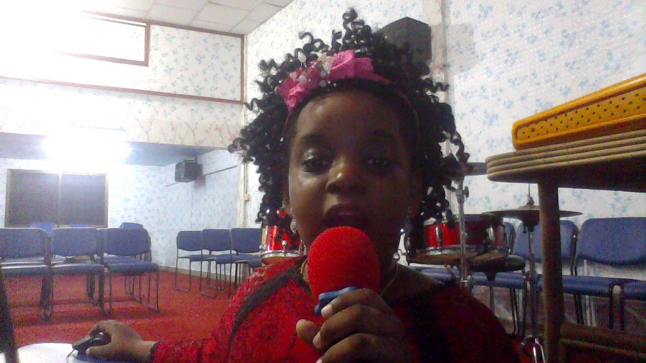 Dancing and singing Holy ghost from joe praize - YouTube