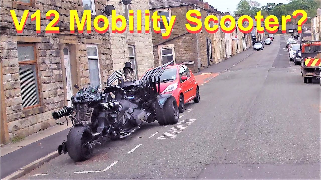 V12 Dragon Trike With Machine Guns and skeleton Mobility Scooter? - YouTube