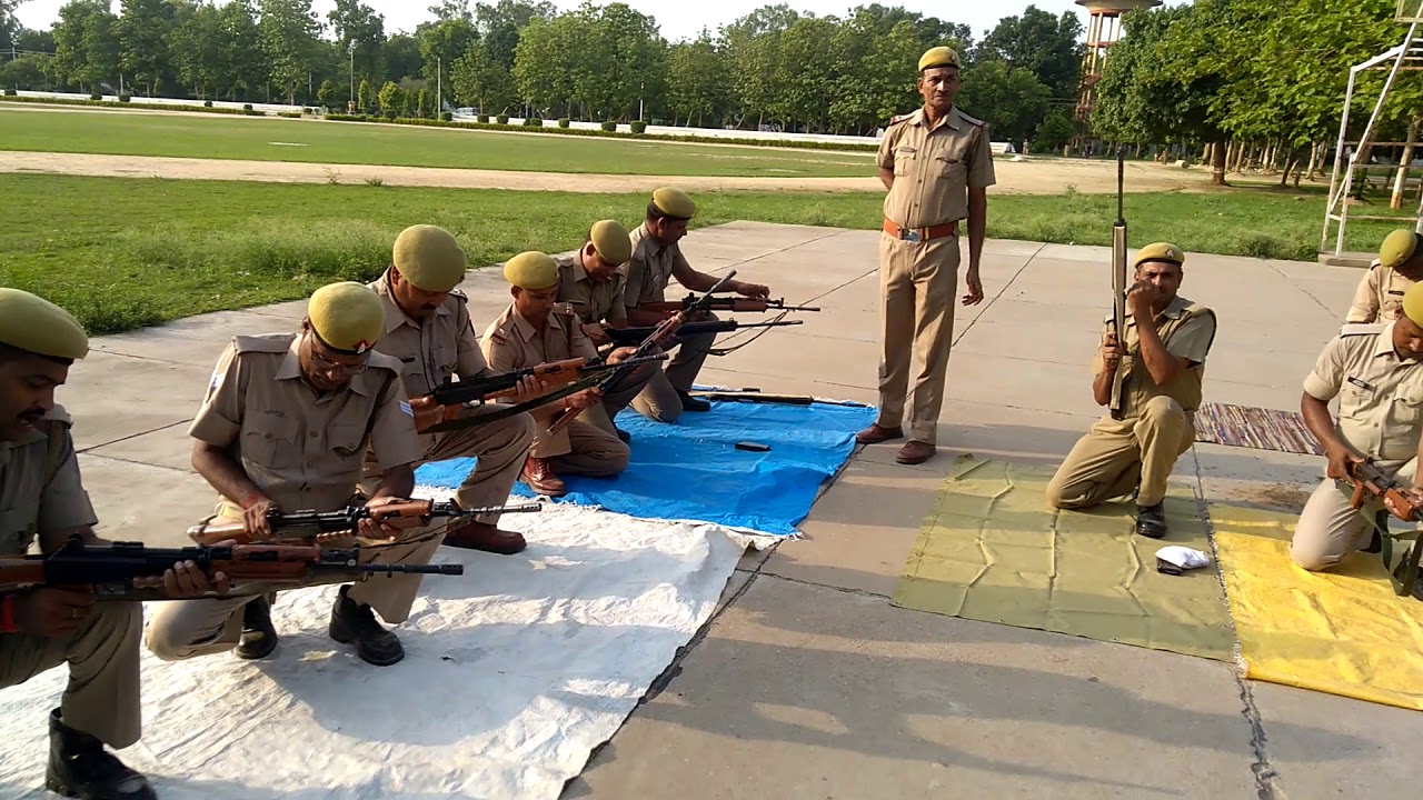 Weapons handling training - YouTube