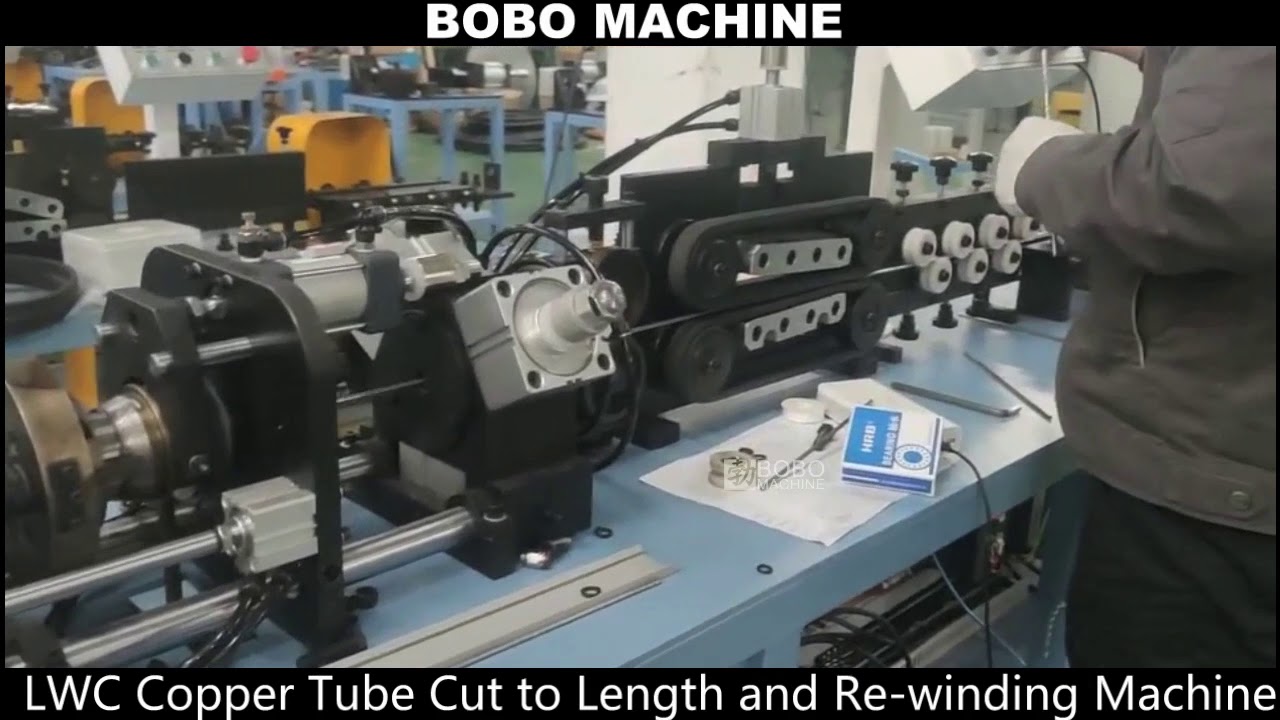 LWC copper tube cut to length and re winding machine - YouTube