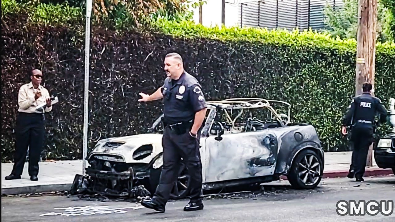 Authorities on Scene: LAPD Removes Burnt Mini Cooper from Hampton Drive ...