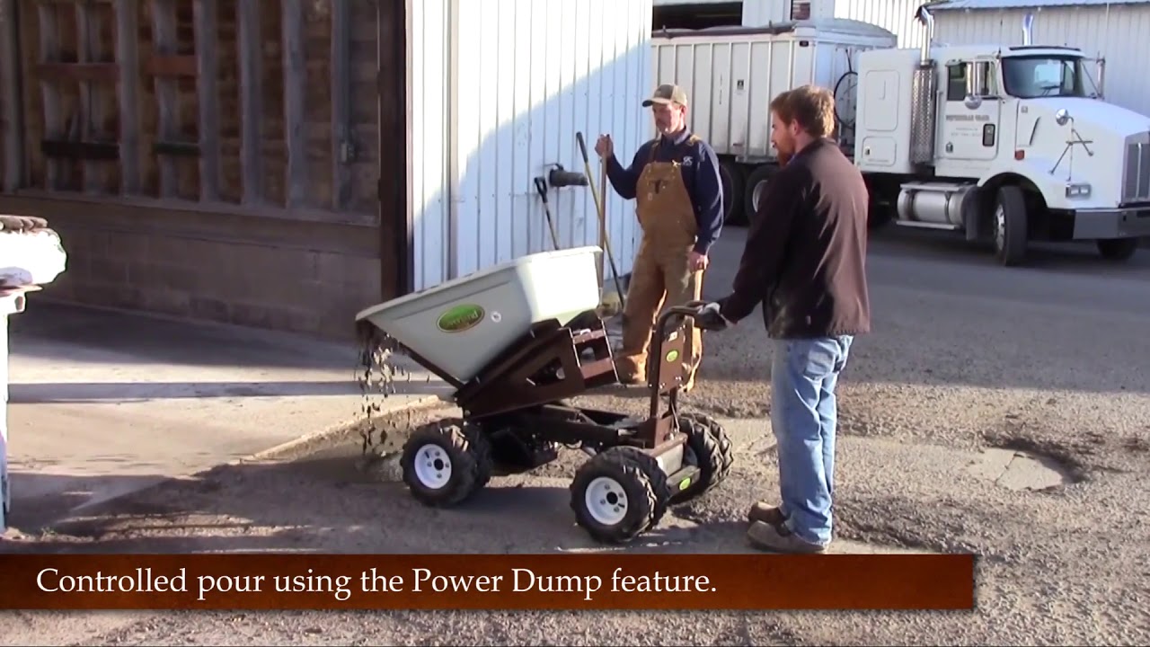 Hercules Electric Wheelbarrow Hauling and Dumping Concrete - YouTube
