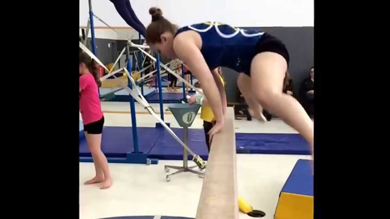 BB mount jump bwd through straddle position over the beam to front ...