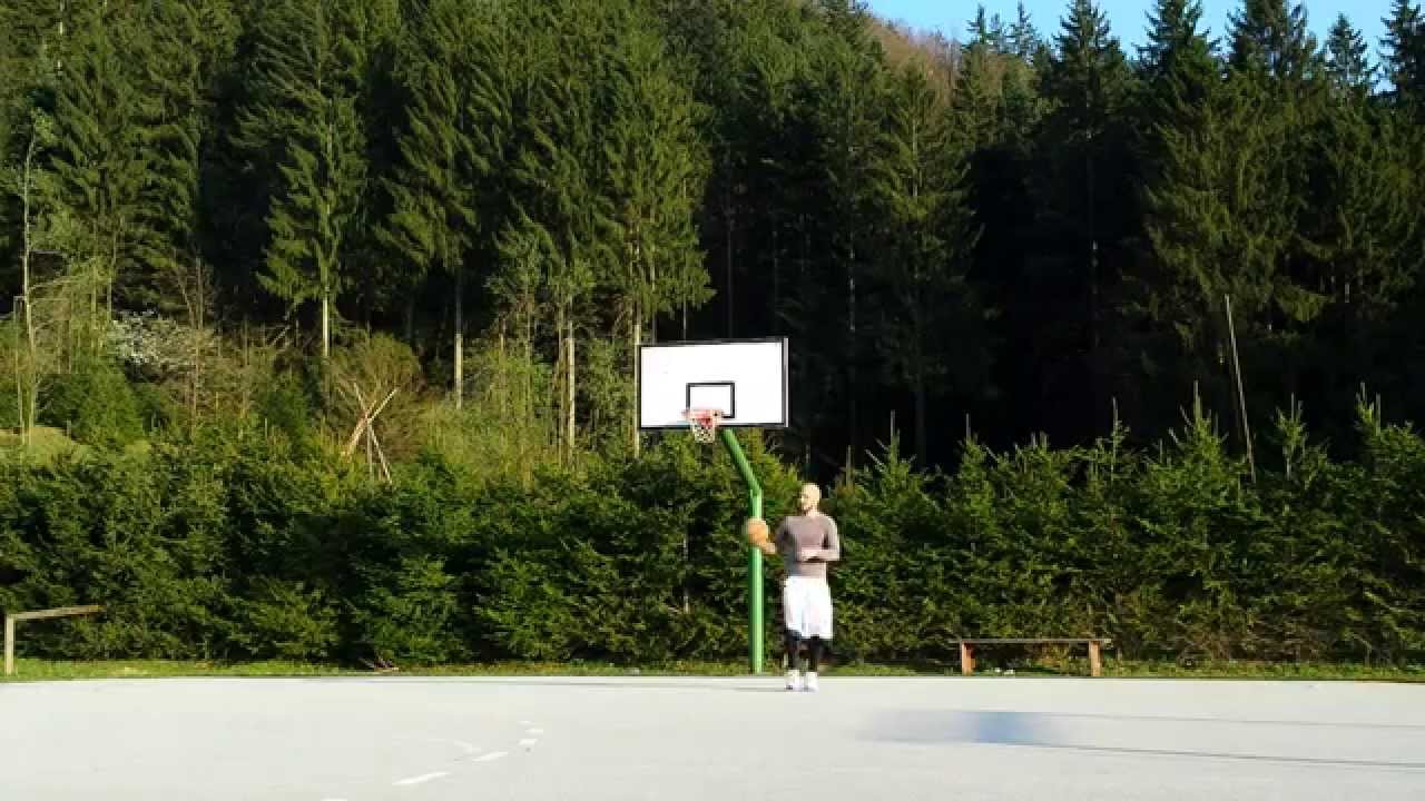 Epic basketball trick shot behind the basket and over the trees - YouTube