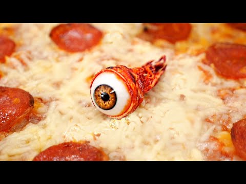 EYEBALL FOUND ON PIZZA!