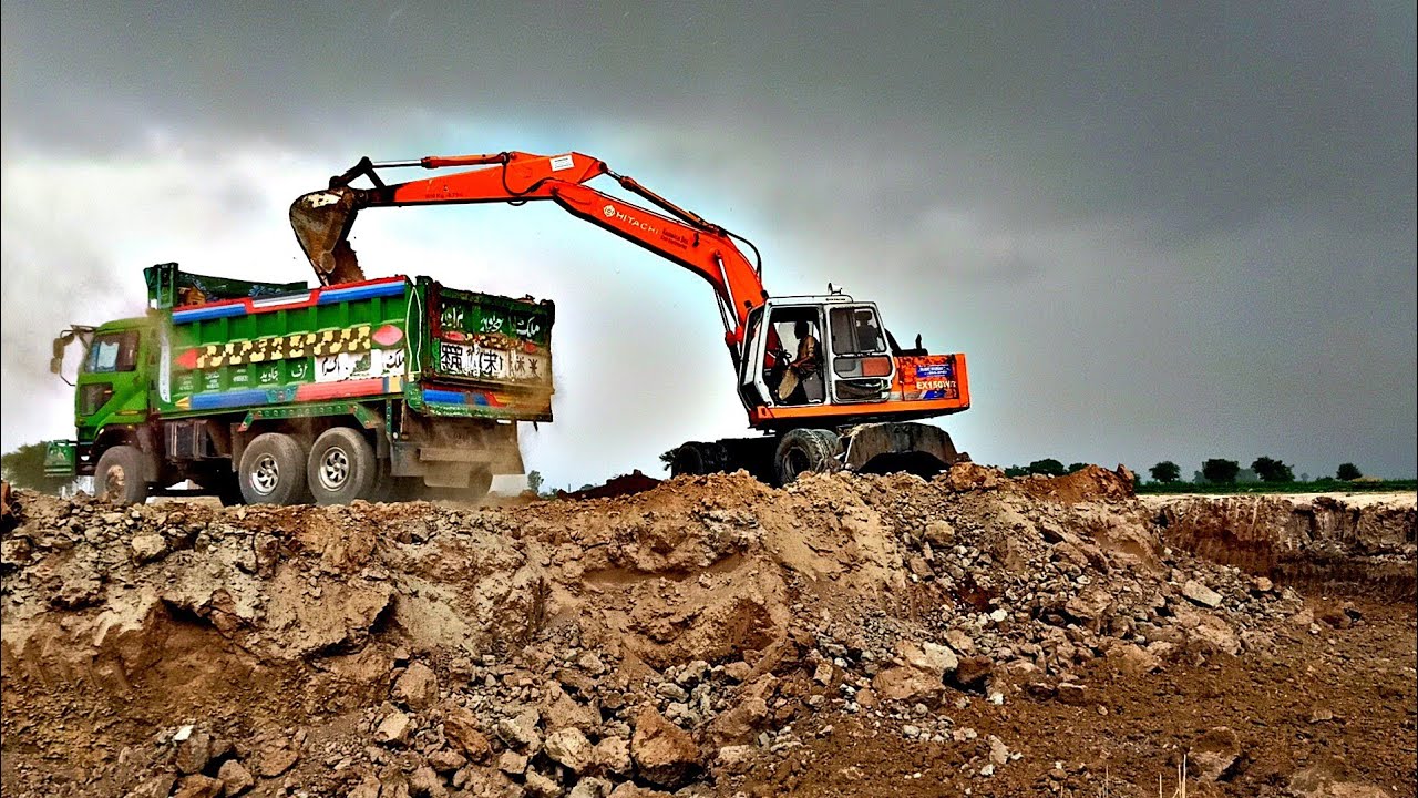 HITACHI 150 excavator loading the dumper - YouTube