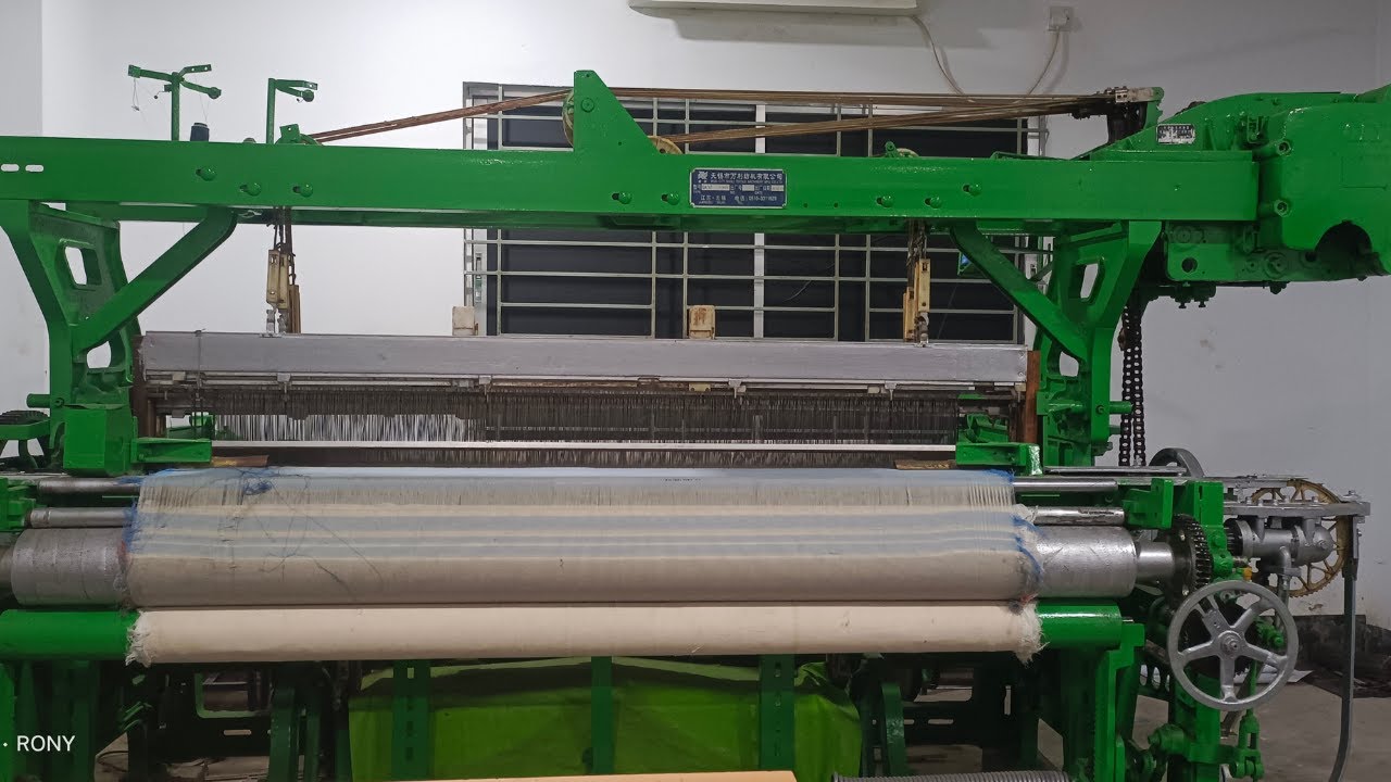 A repair loom machine produces a woven fabric | Fabric Manufacturing ...