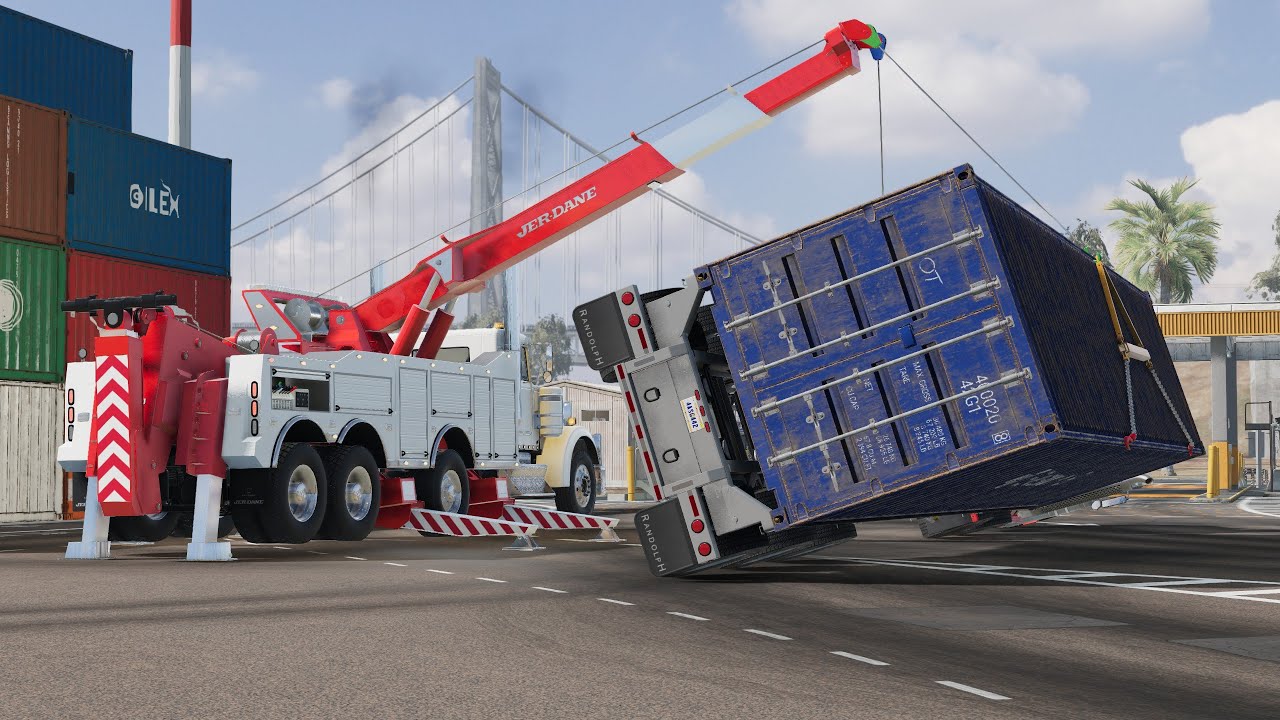 Nice rotator demonstrates a smooth roll of a loaded container truck and ...