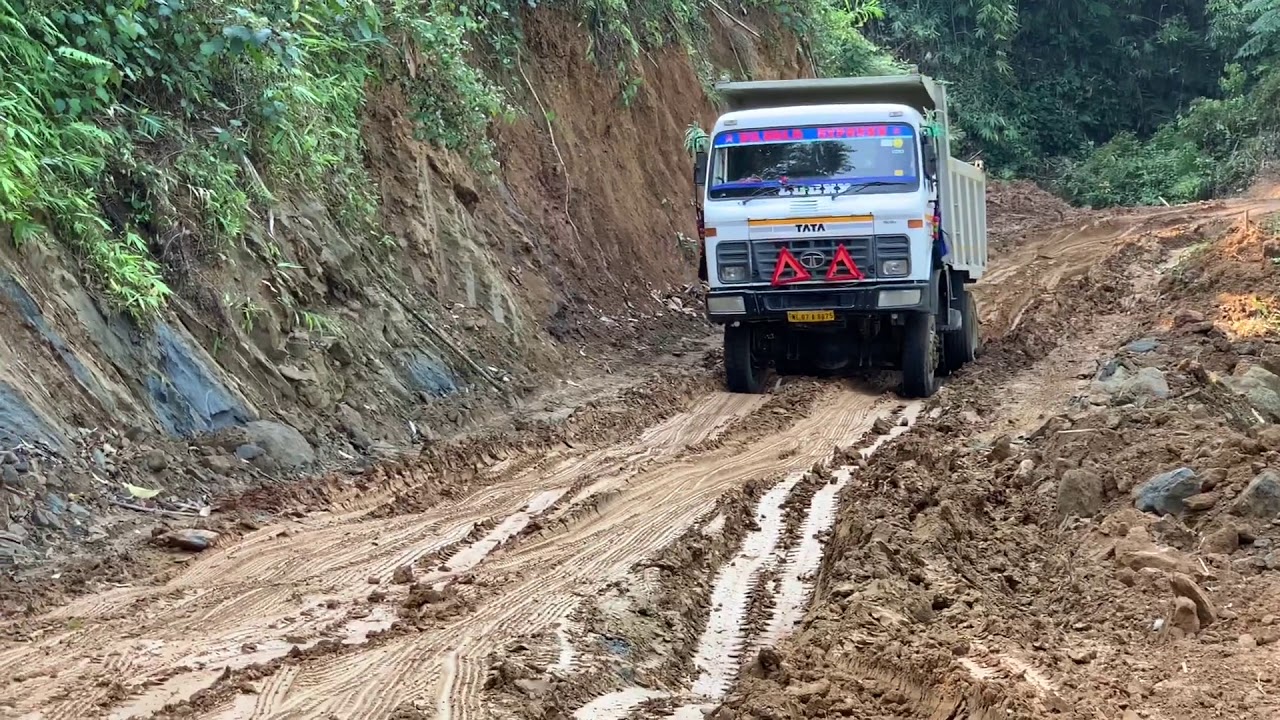 Tata 1618 4x4 tipper offroad trying a slippery climb ( Nagaland ) - YouTube