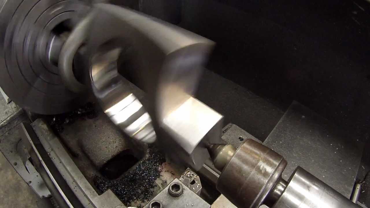 Turning first end of trunion - YouTube