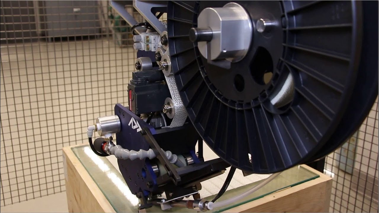 Dry fiber placement using FANUC robot and AFP-XS - YouTube