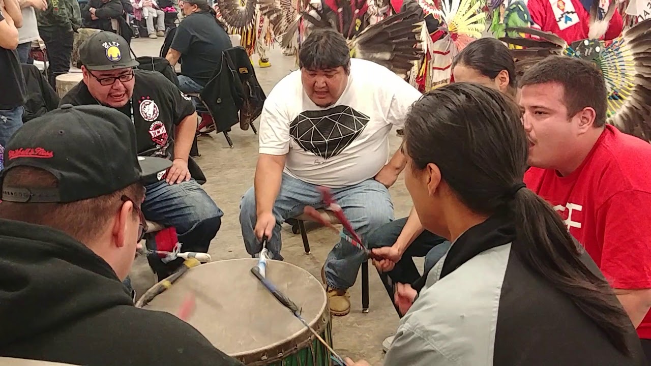 Brown bear singers singing grand entry - YouTube