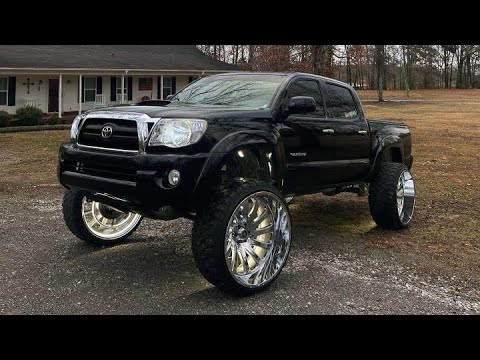 Squatted Tacoma on 26x14 and 35s! - YouTube