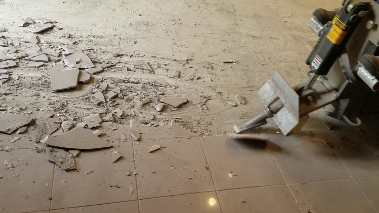 Tile removal by Gabriel Homes 5700 scraper January 23, 2020 - YouTube