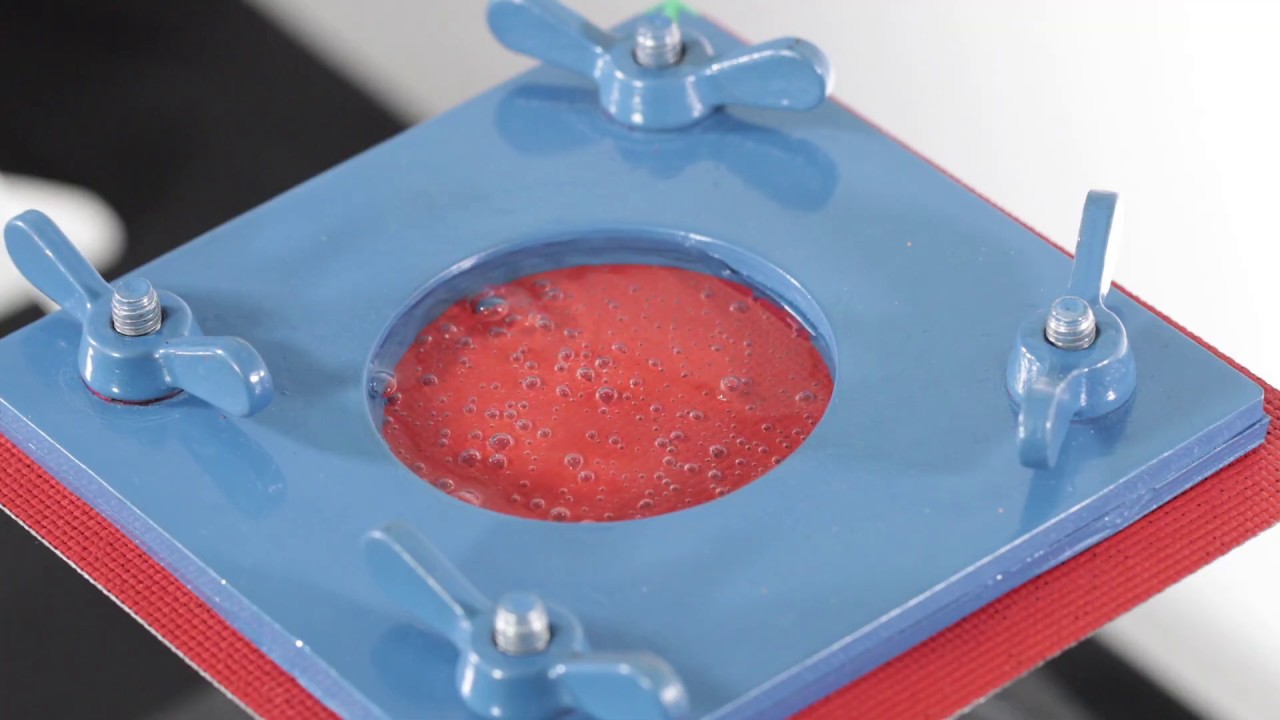 Porosity Testing - TCI's non-porous laminated CrossFilm™ barrier. - YouTube