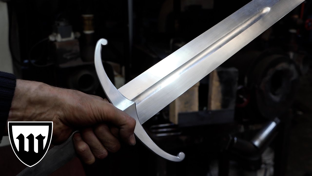 Forging a arming sword, part 3, forging the guard. - YouTube