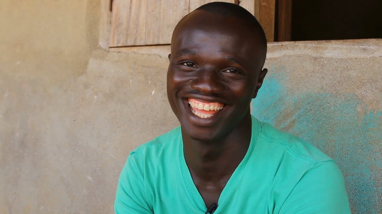 The Ebola burial man with a big smile - YouTube