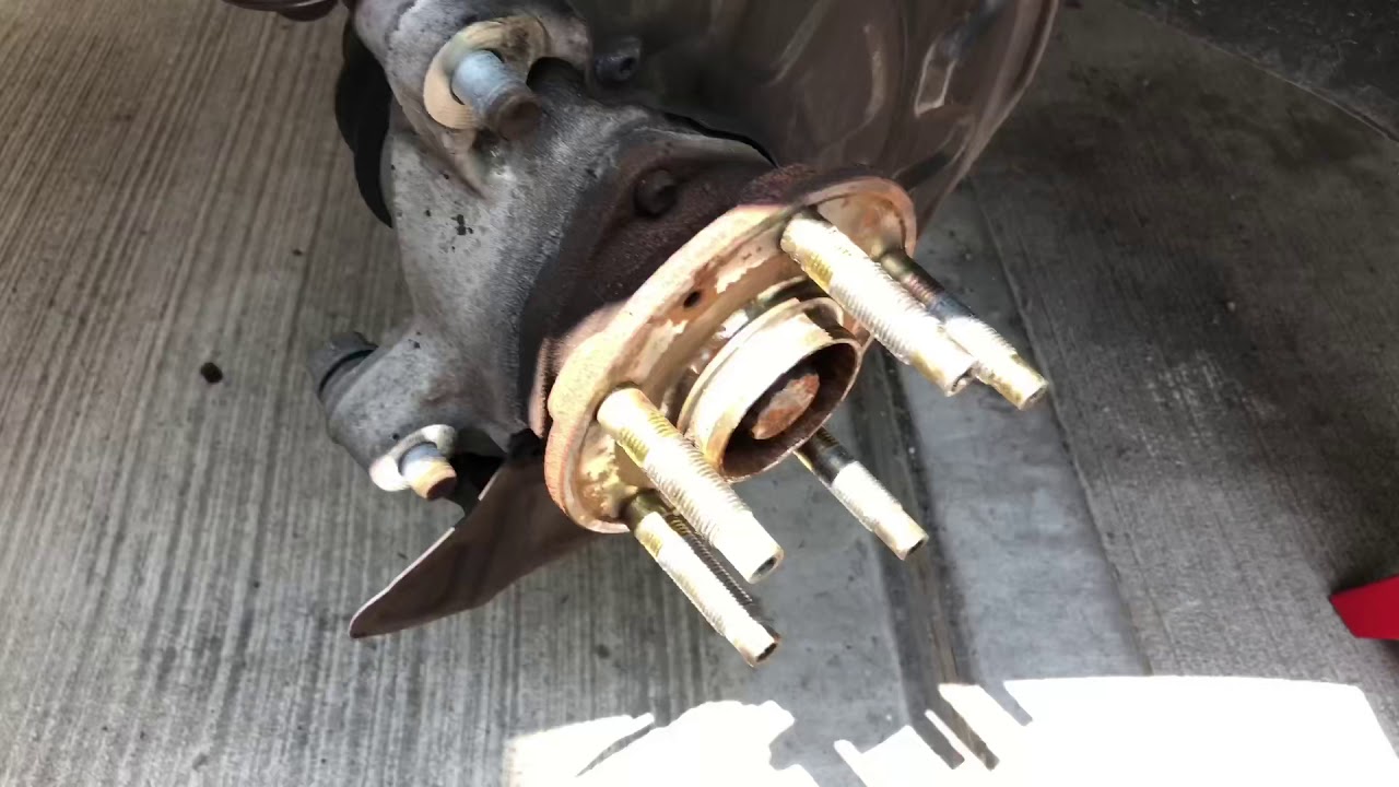 ECS Tuning 2-piece slotted and drilled rotors installation - YouTube